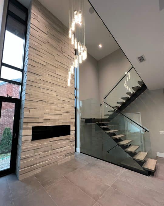 Silver fox 2 story fireplace - goodfellagroup